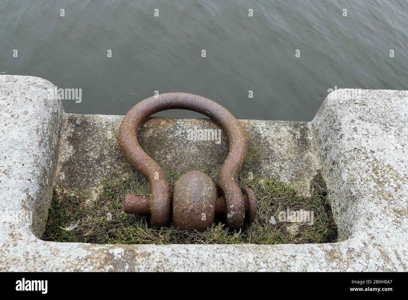Shackle for ship attachment on the shore, pier - detail shot Stock ...
