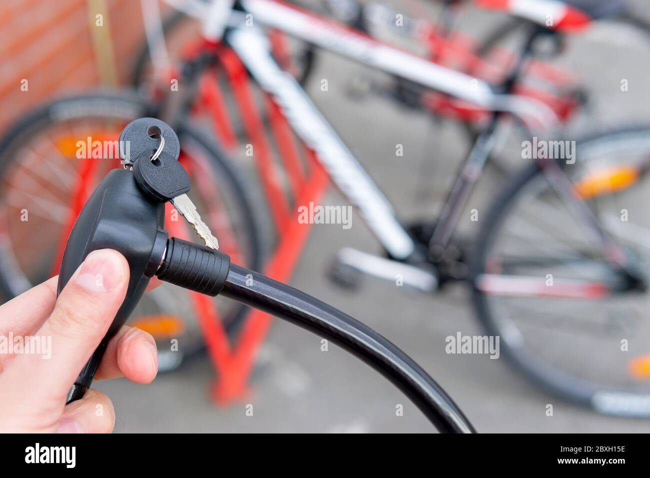 bicycle keys on the background of a bicycle. Protecting a mountain bike ...