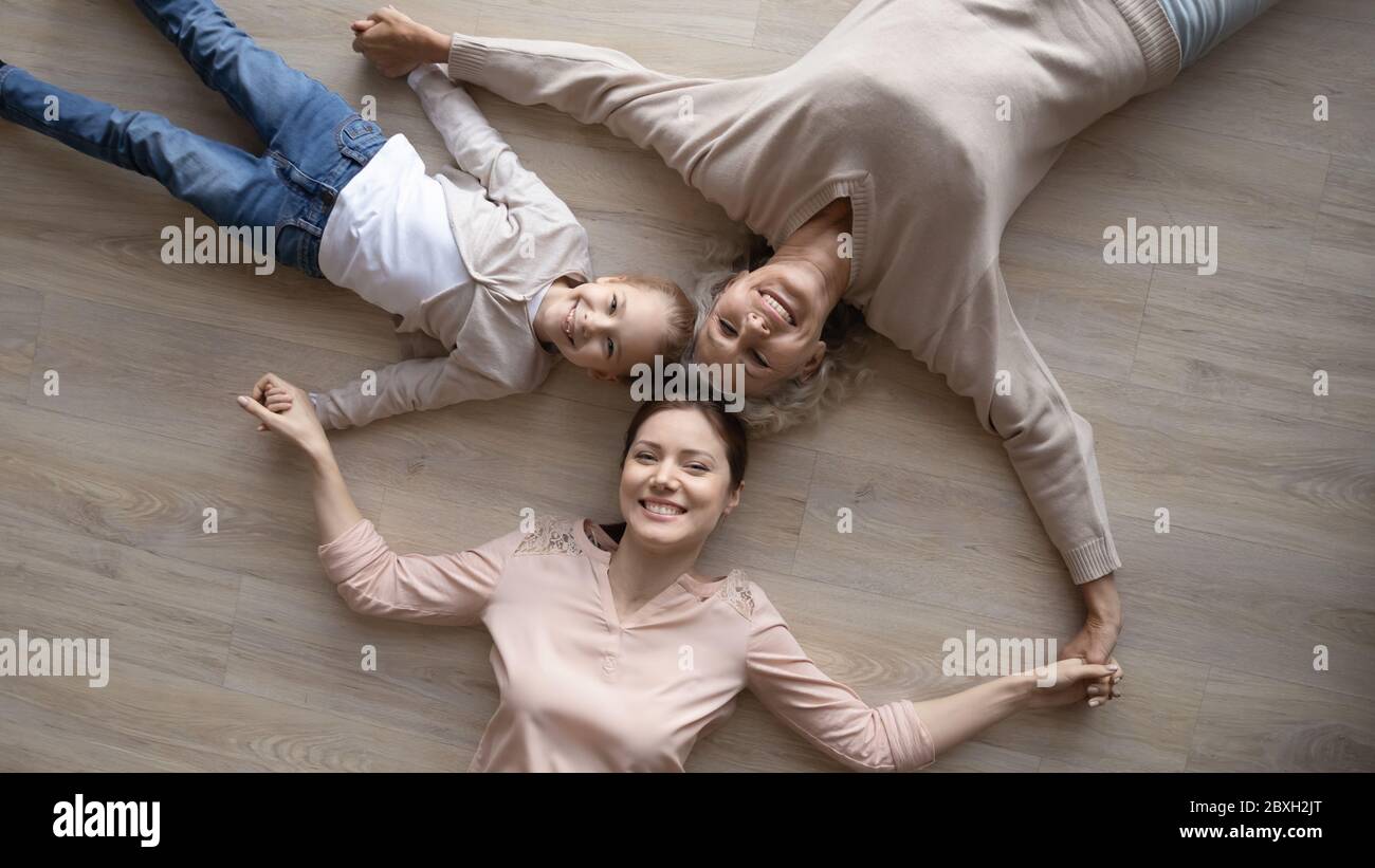 Top view portrait of smiling three generations of women Stock Photo - Alamy