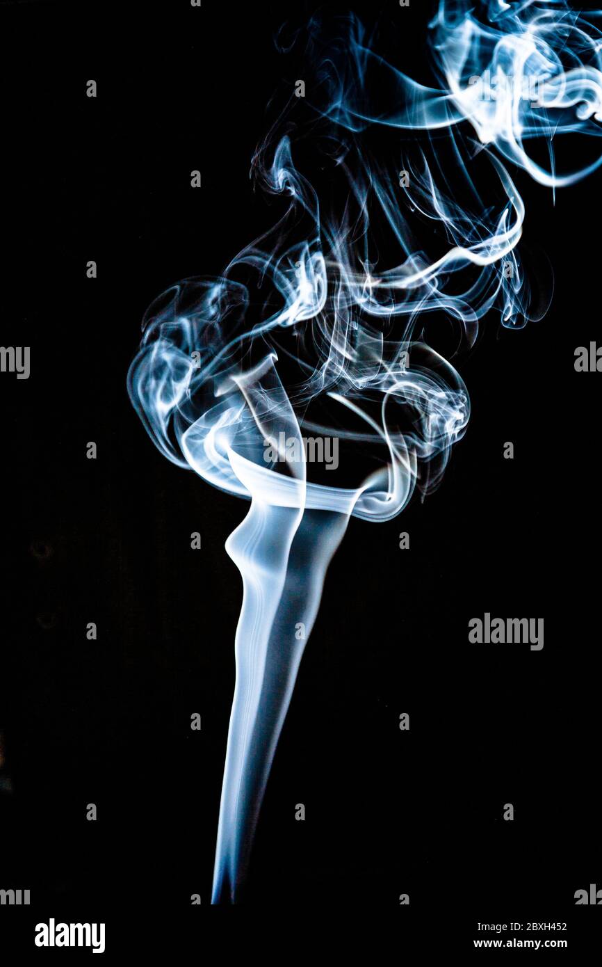 Smoke patterns from Incense sticks, captured by flash Stock Photo - Alamy