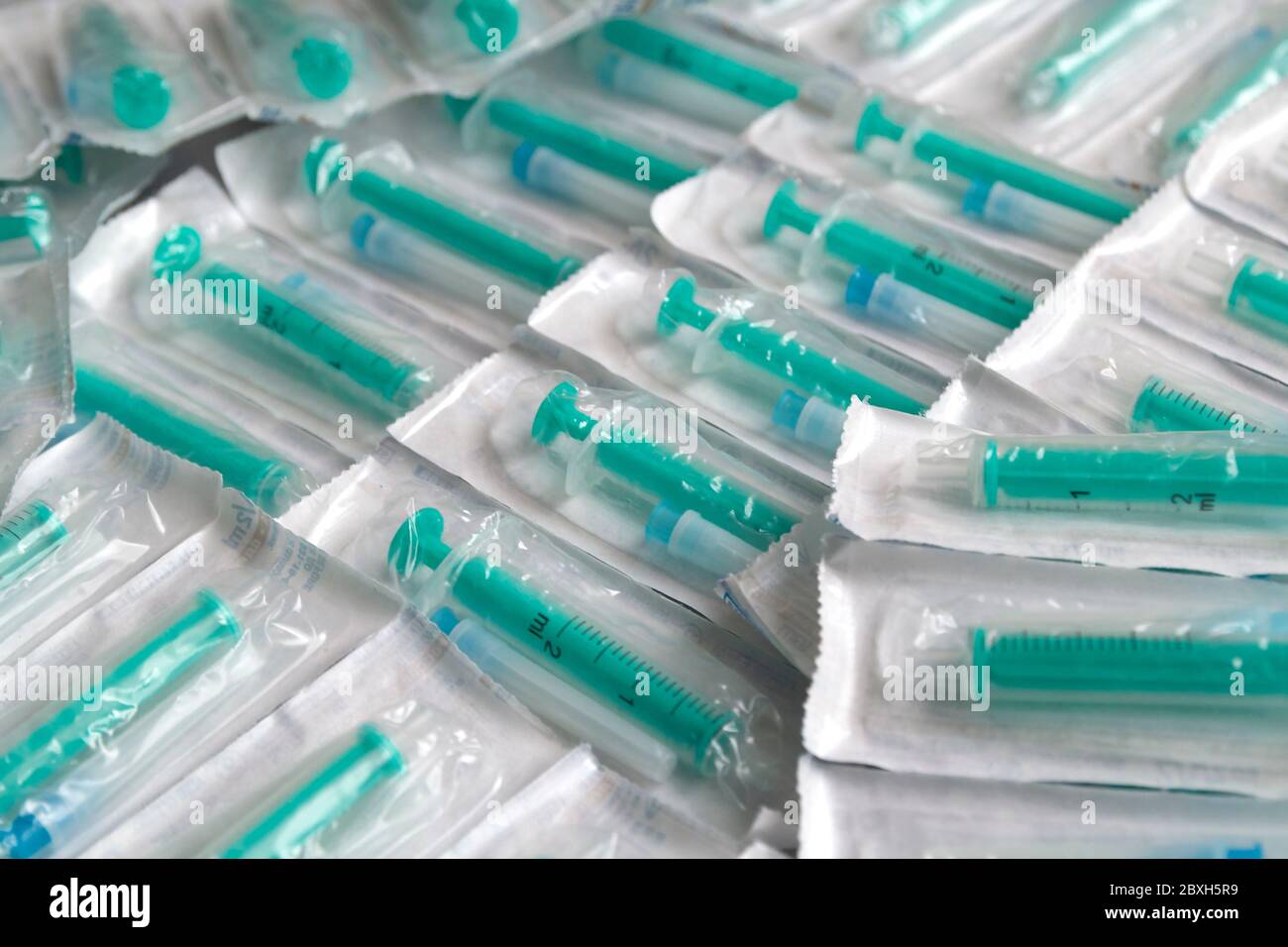 Medical syringes in a package. A bunch of unused, packaged syringes ...