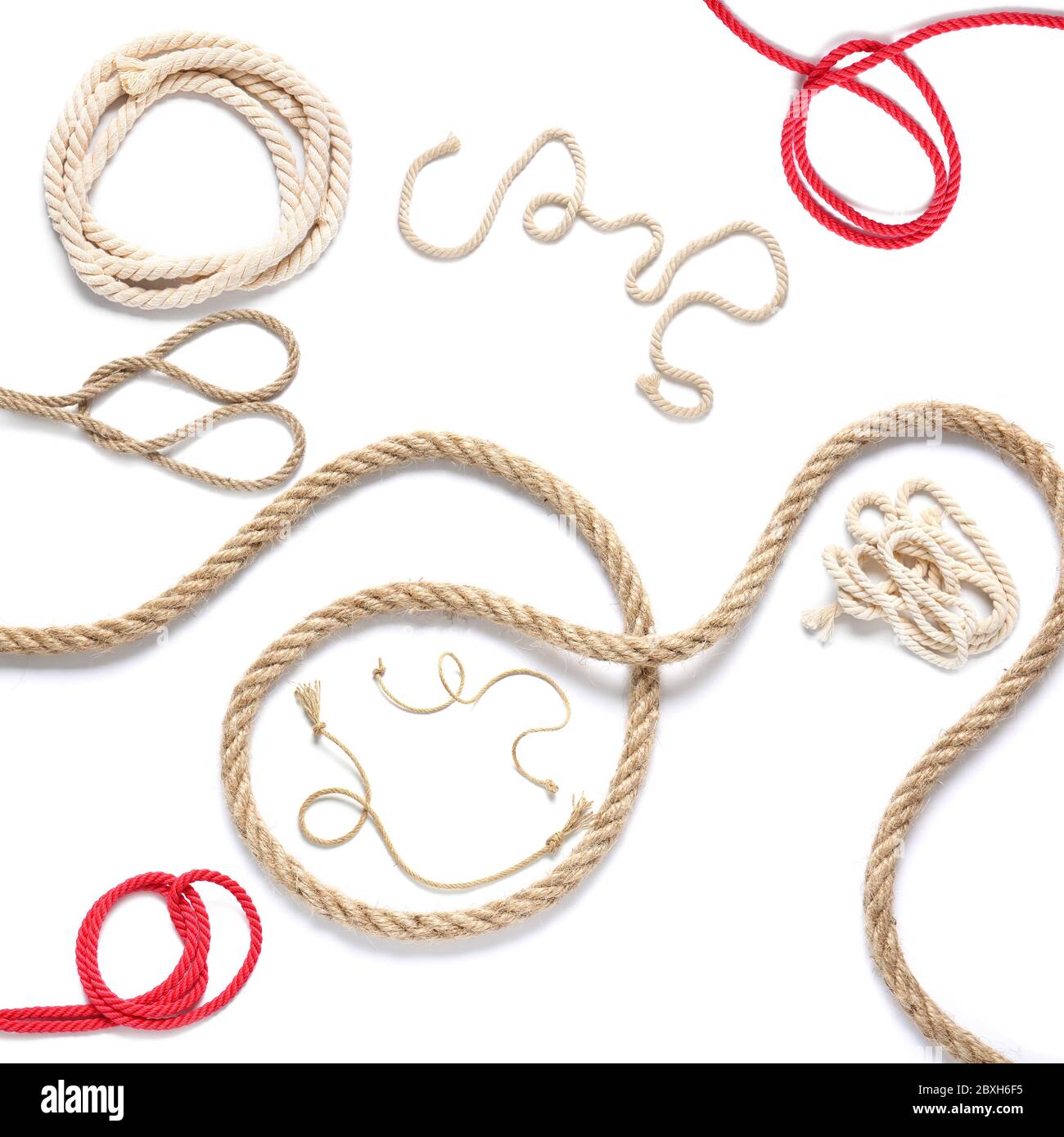 Different ropes on white background Stock Photo - Alamy