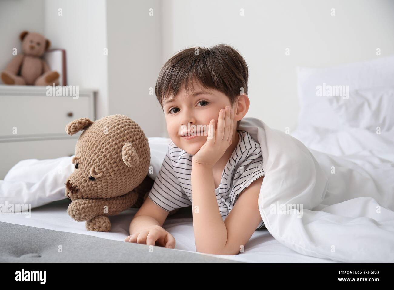 Morning of little boy in bedroom Stock Photo - Alamy