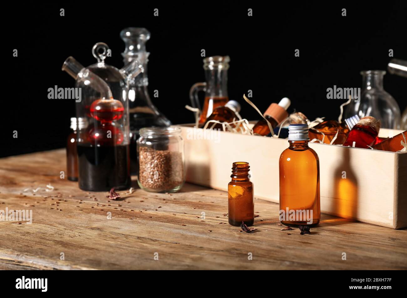 Different potions on alchemist's table Stock Photo - Alamy