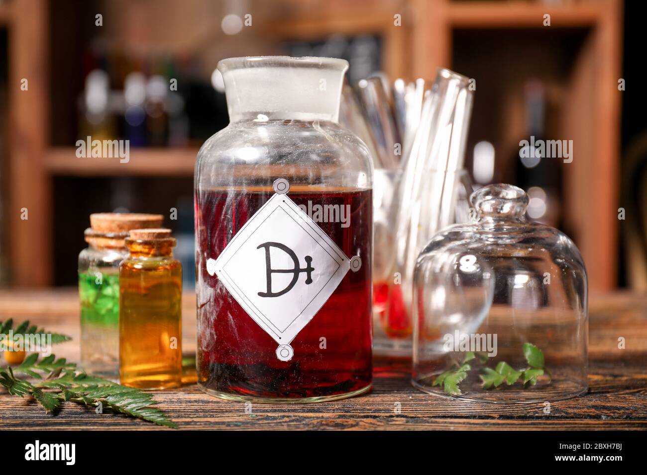 Different potions on table in alchemist's laboratory Stock Photo - Alamy