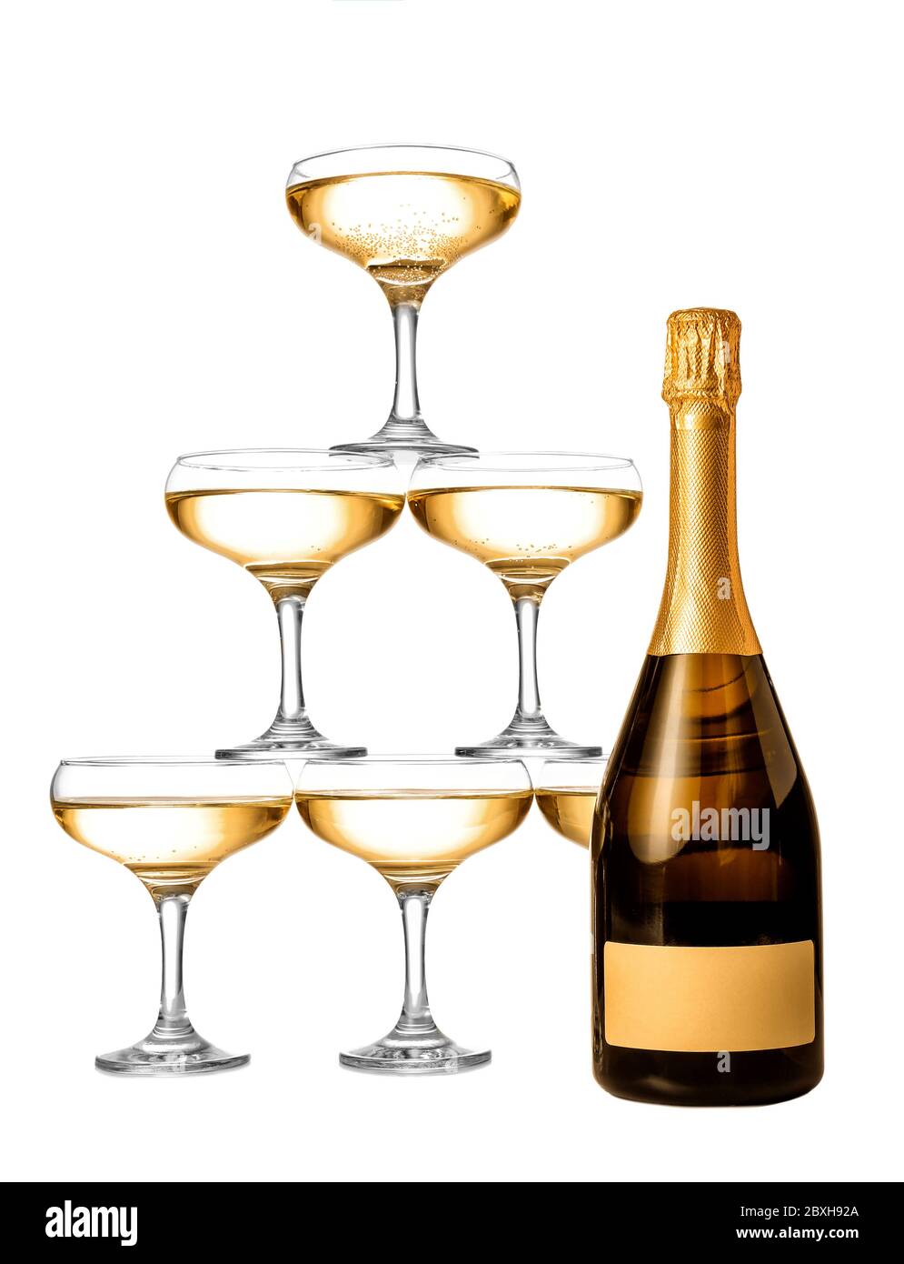 Bottle of champagne and tower made of glasses on white background Stock ...