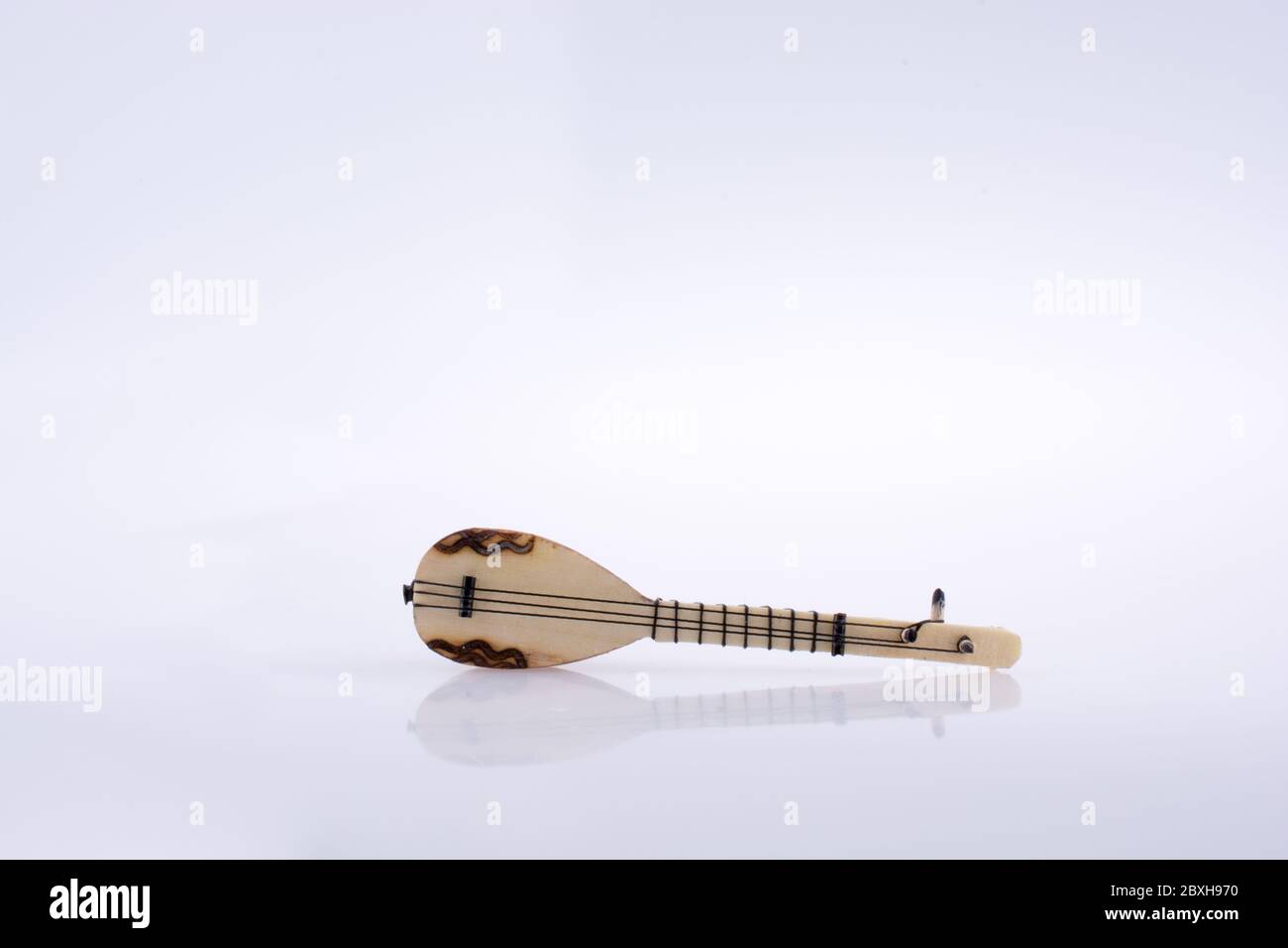 Model of Turkish musical instrument saz on a white background Stock ...