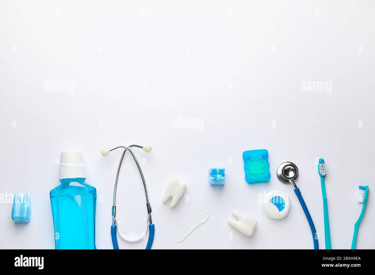 Set for oral hygiene with stethoscope on white background Stock Photo ...