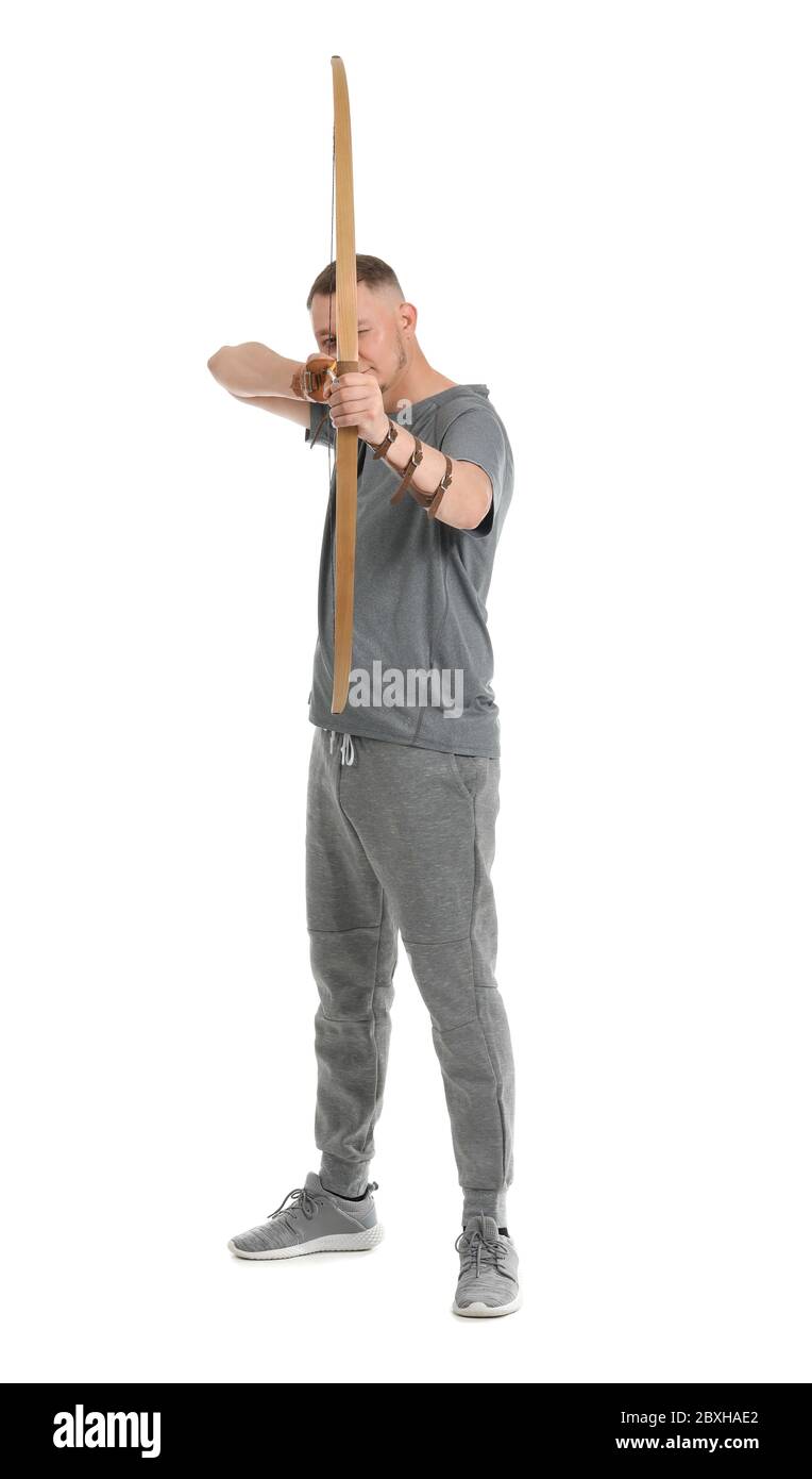 Handsome male archer with bow on white background Stock Photo - Alamy