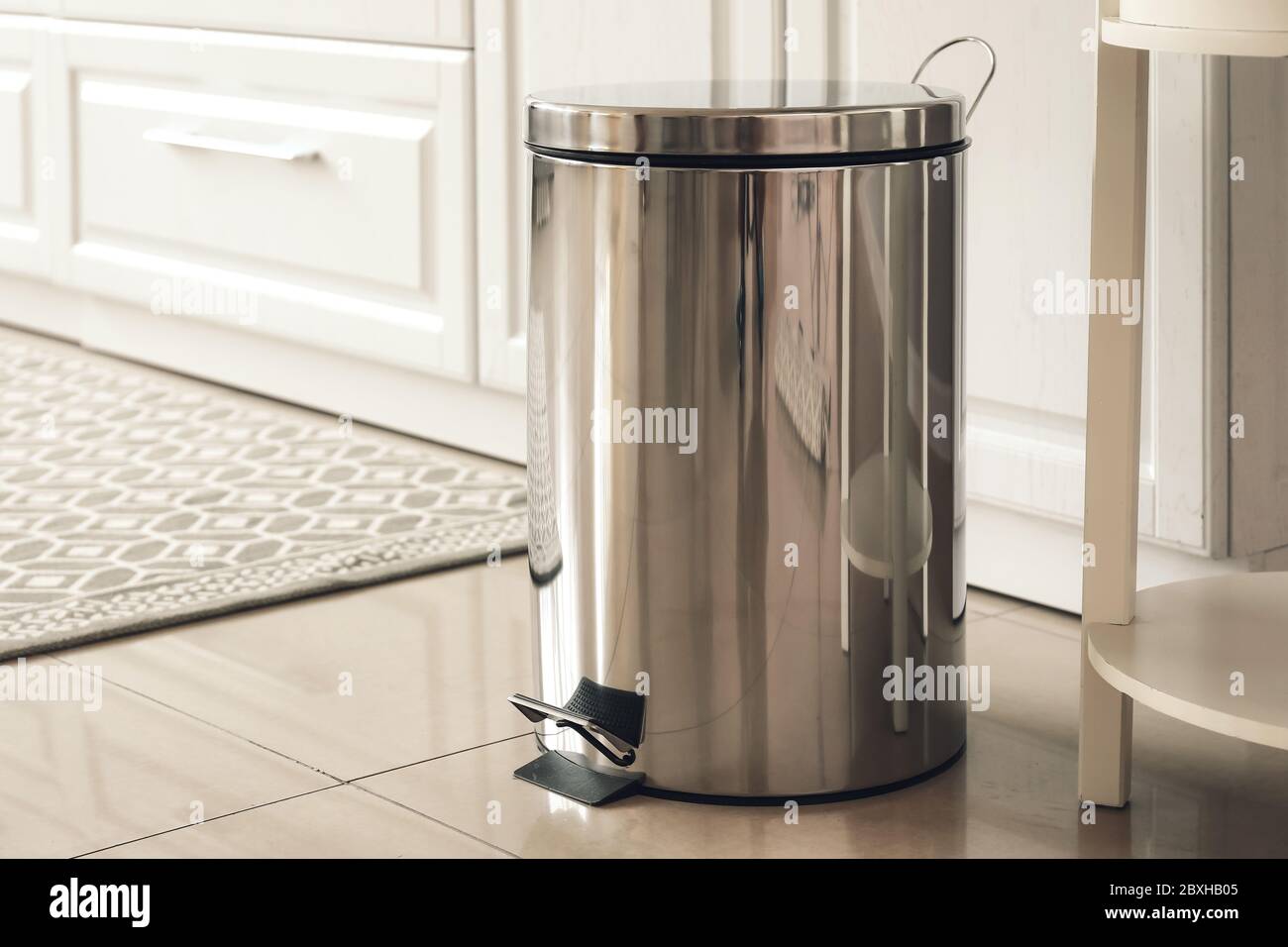 Clean trash bin in modern kitchen Stock Photo - Alamy