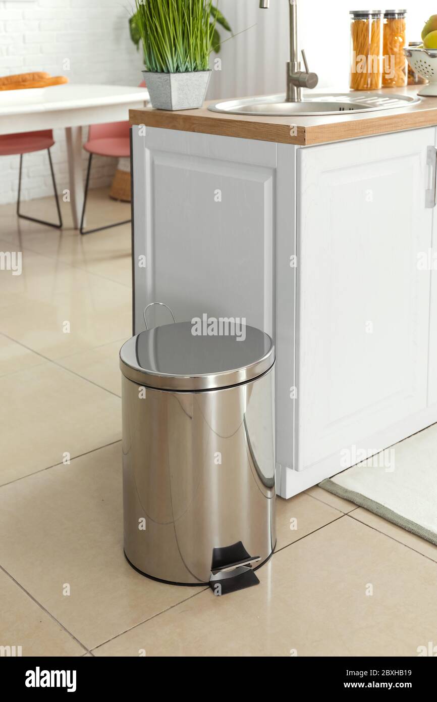 Clean trash bin in modern kitchen Stock Photo - Alamy