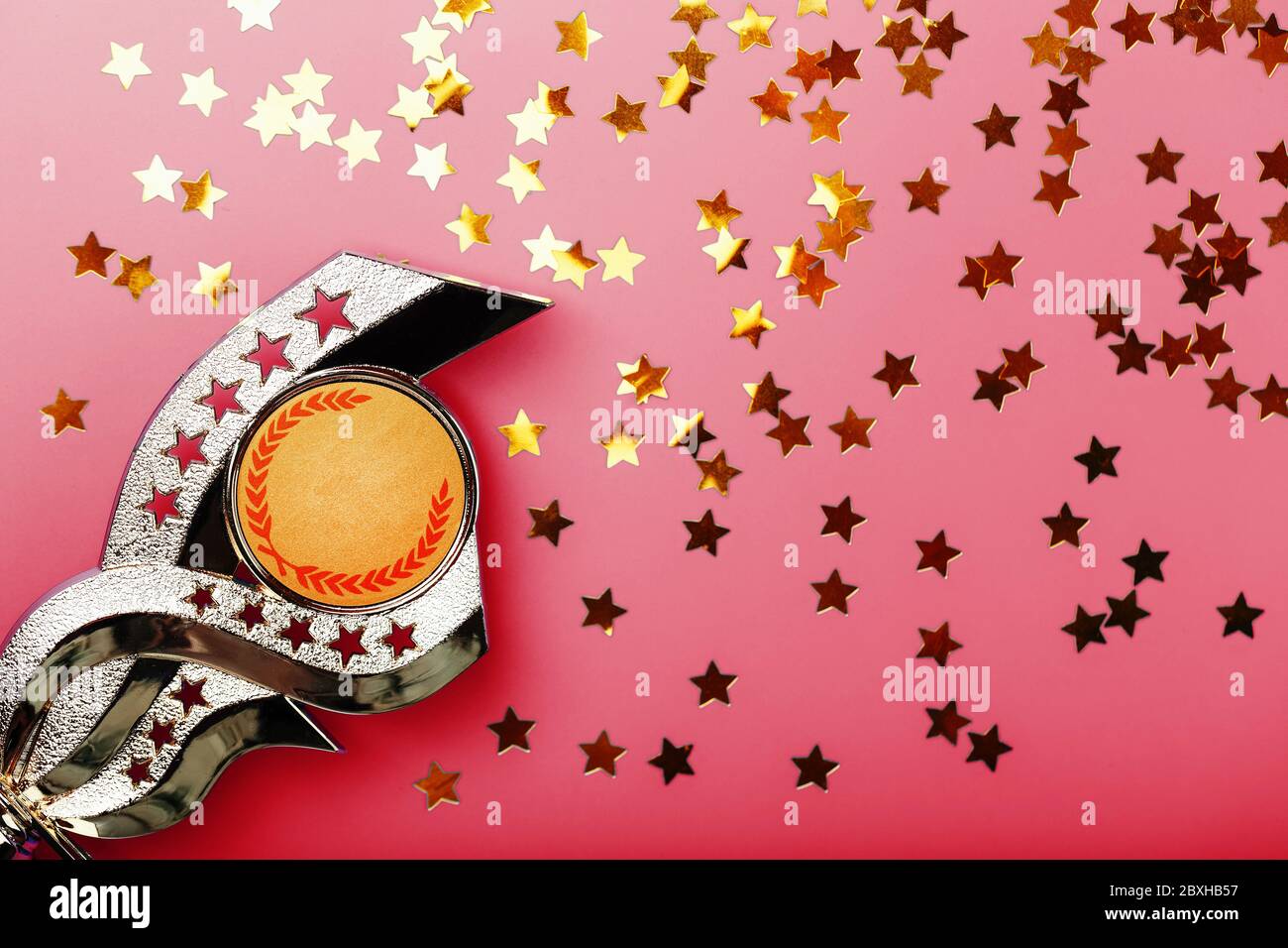 Superprize of gold with fireworks of stars on a red background Stock ...