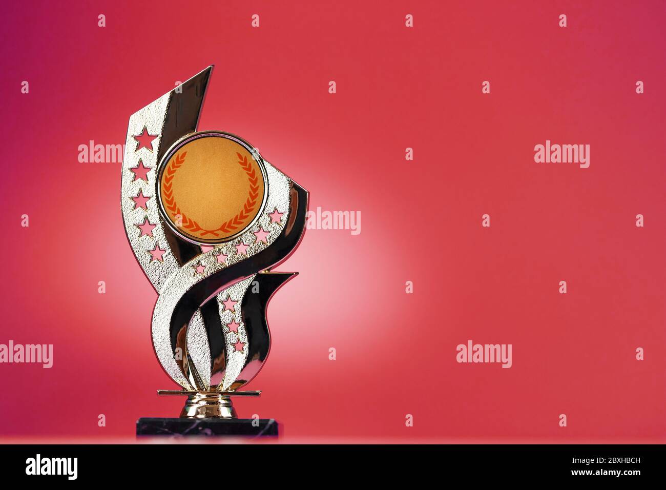 Gold prize on a red background. Super prize Stock Photo - Alamy