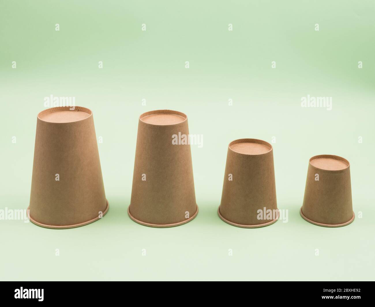 Eco-friendly cookware on a green background Stock Photo - Alamy