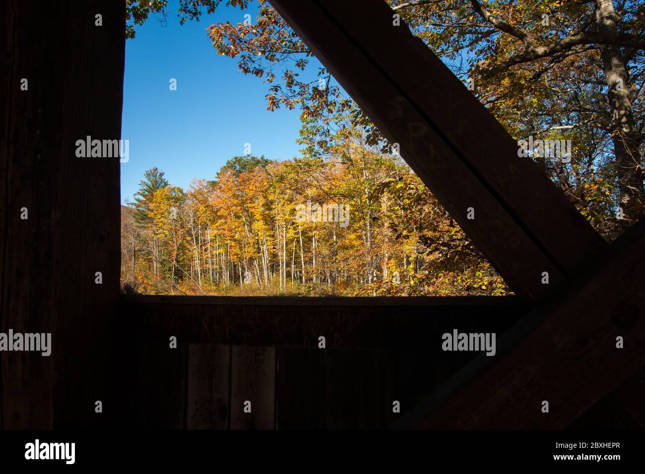 Auntumn colors view through structural detail of Sunday River historic ...