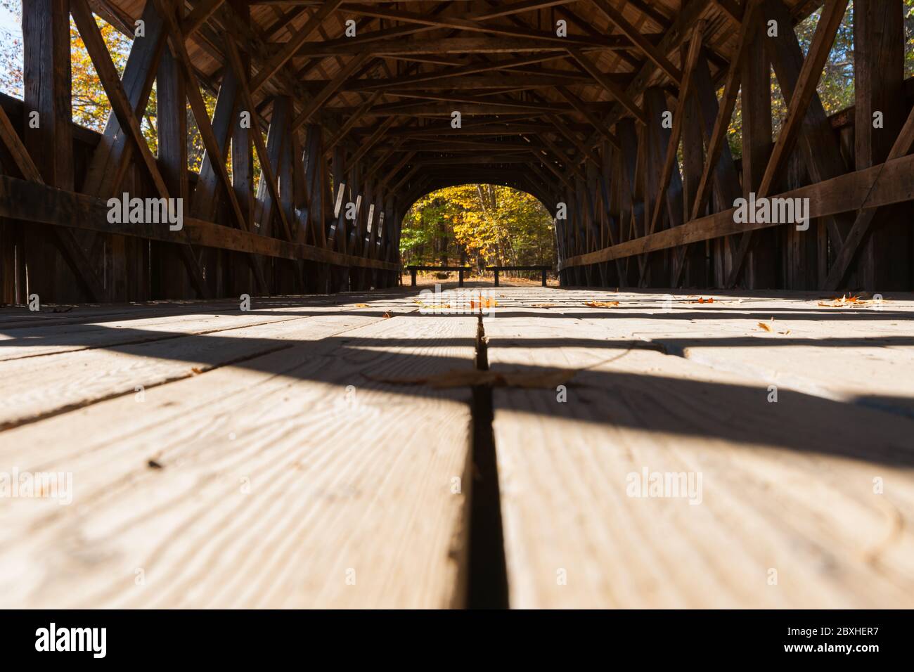 View along platform of Sunday River covered bridge with structure ...