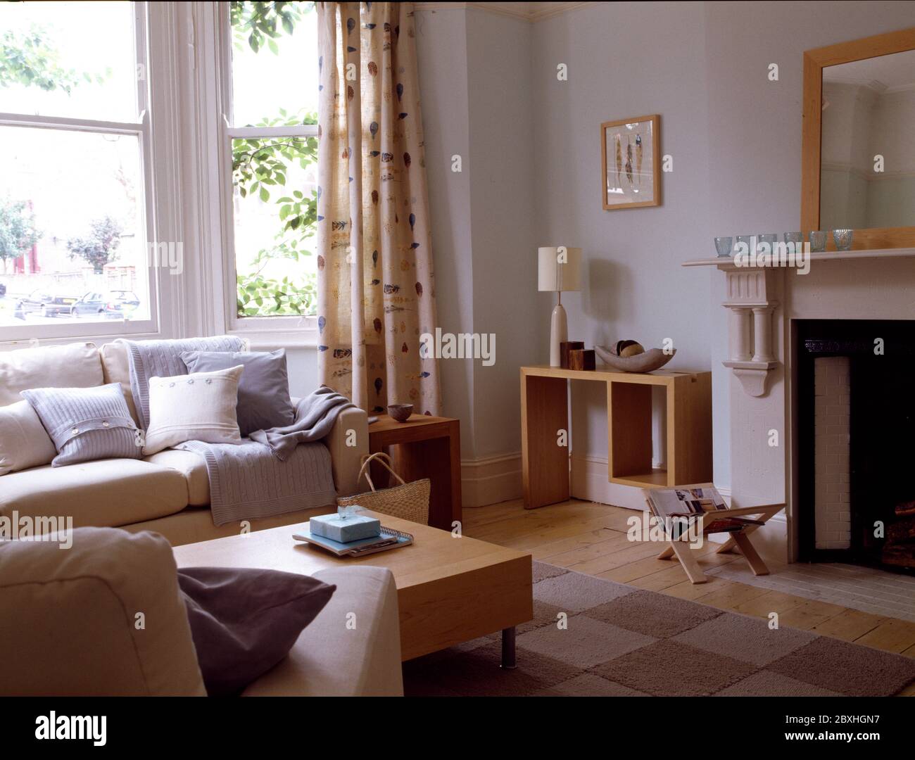 Modern style living room in victorian house Stock Photo - Alamy