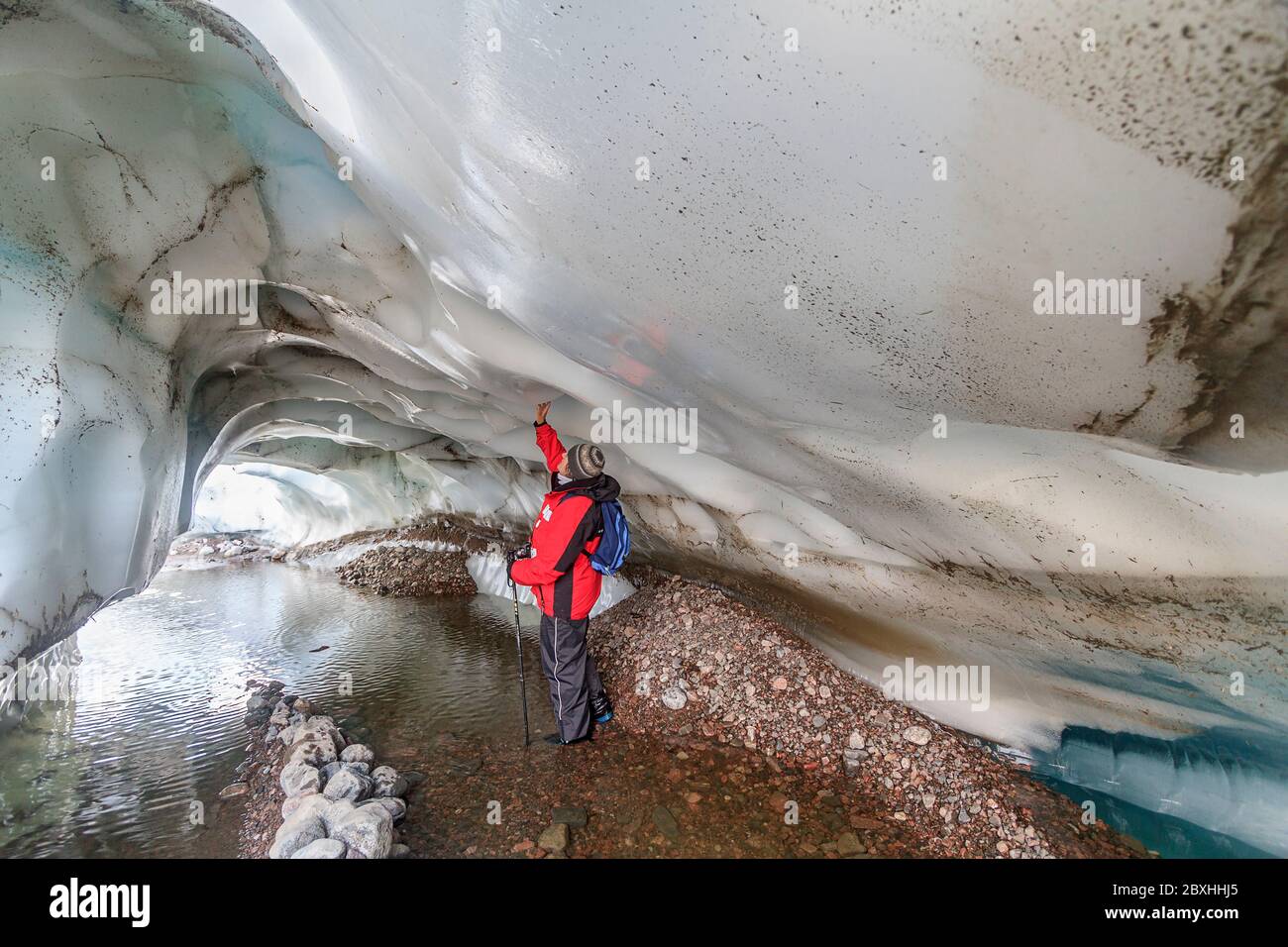 Small ice cave at toe of Brother John Glacier at the old Inuit village site of Etah along the ...