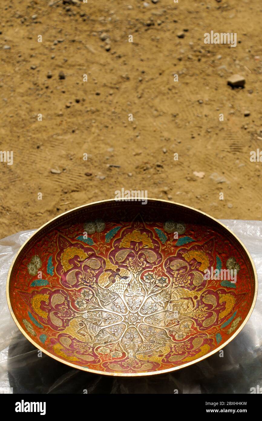 Antique decorative metallic traditional pattern plate Stock Photo - Alamy