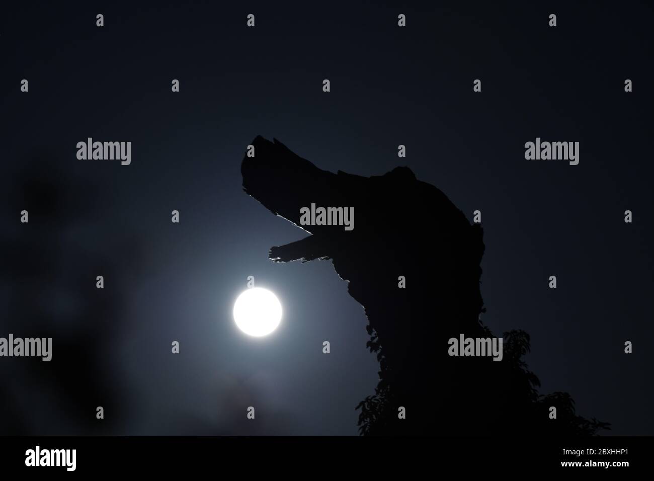 Jurassic moonlight over the Ironbridge Gorge with the moon silhouetting ...