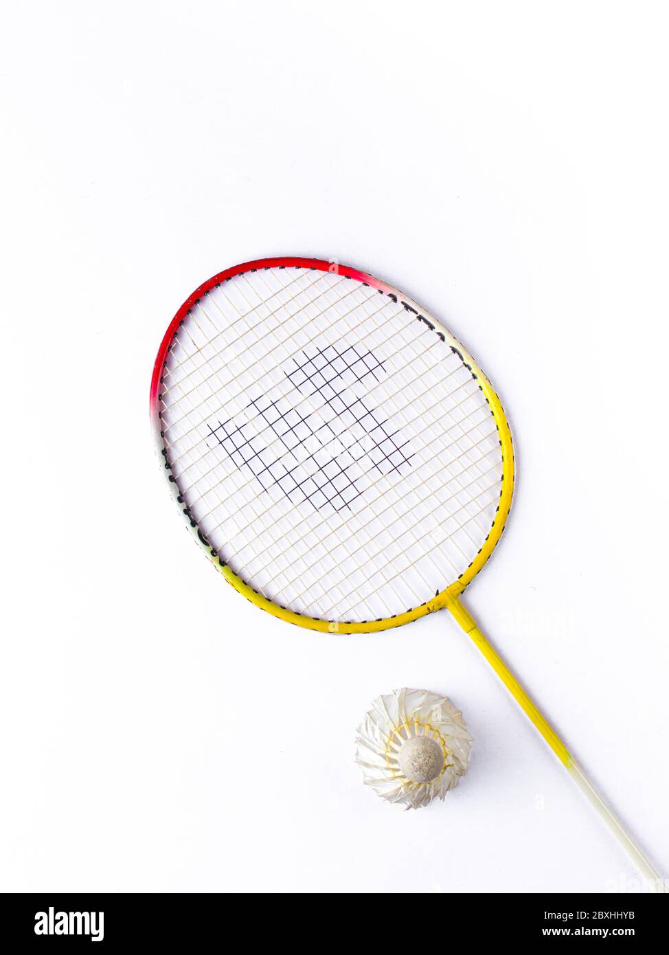 Badminton racket and White Feather Shuttlecock with a colour green ...