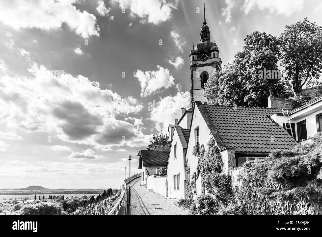 Tower of Church of St. Peter and Paul in Melnik, Czech Republic. Black ...