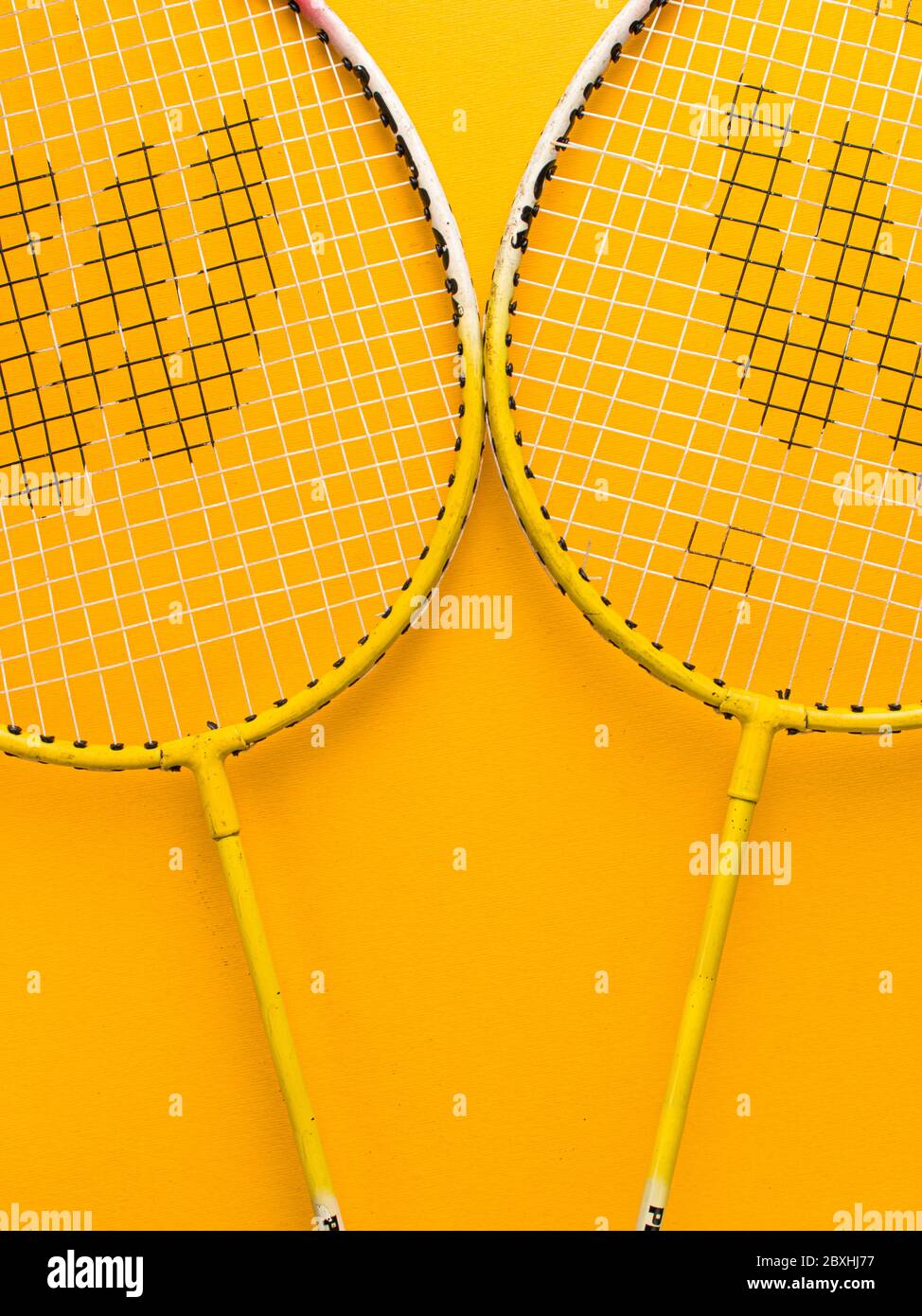 Badminton racket and White Feather Shuttlecock with a colour green ...