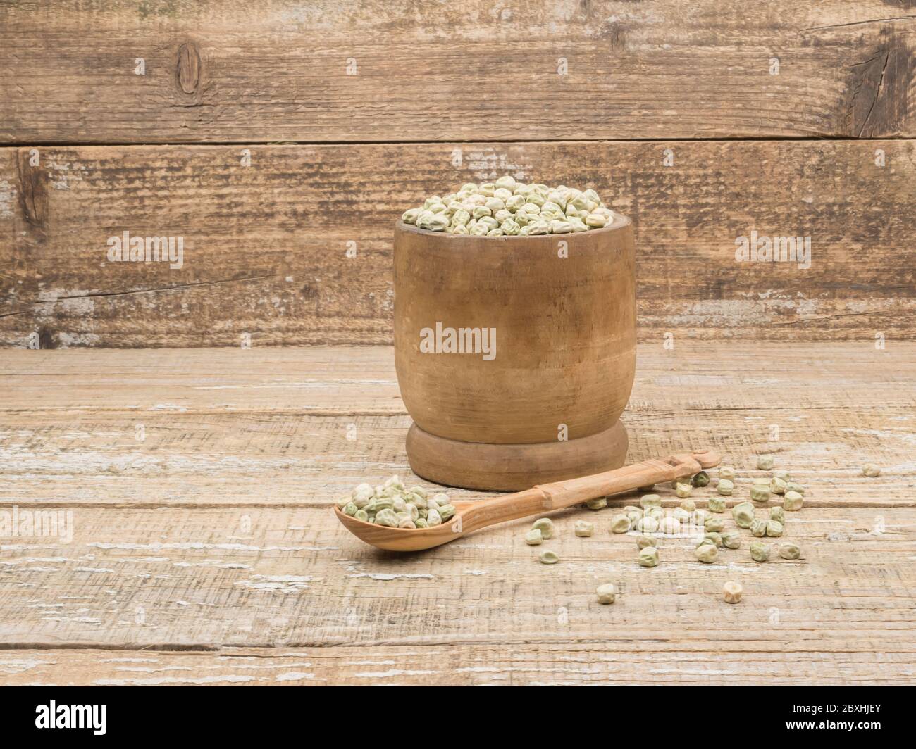 Dry pea grains for planting in the ground on wooden spoon Stock Photo ...