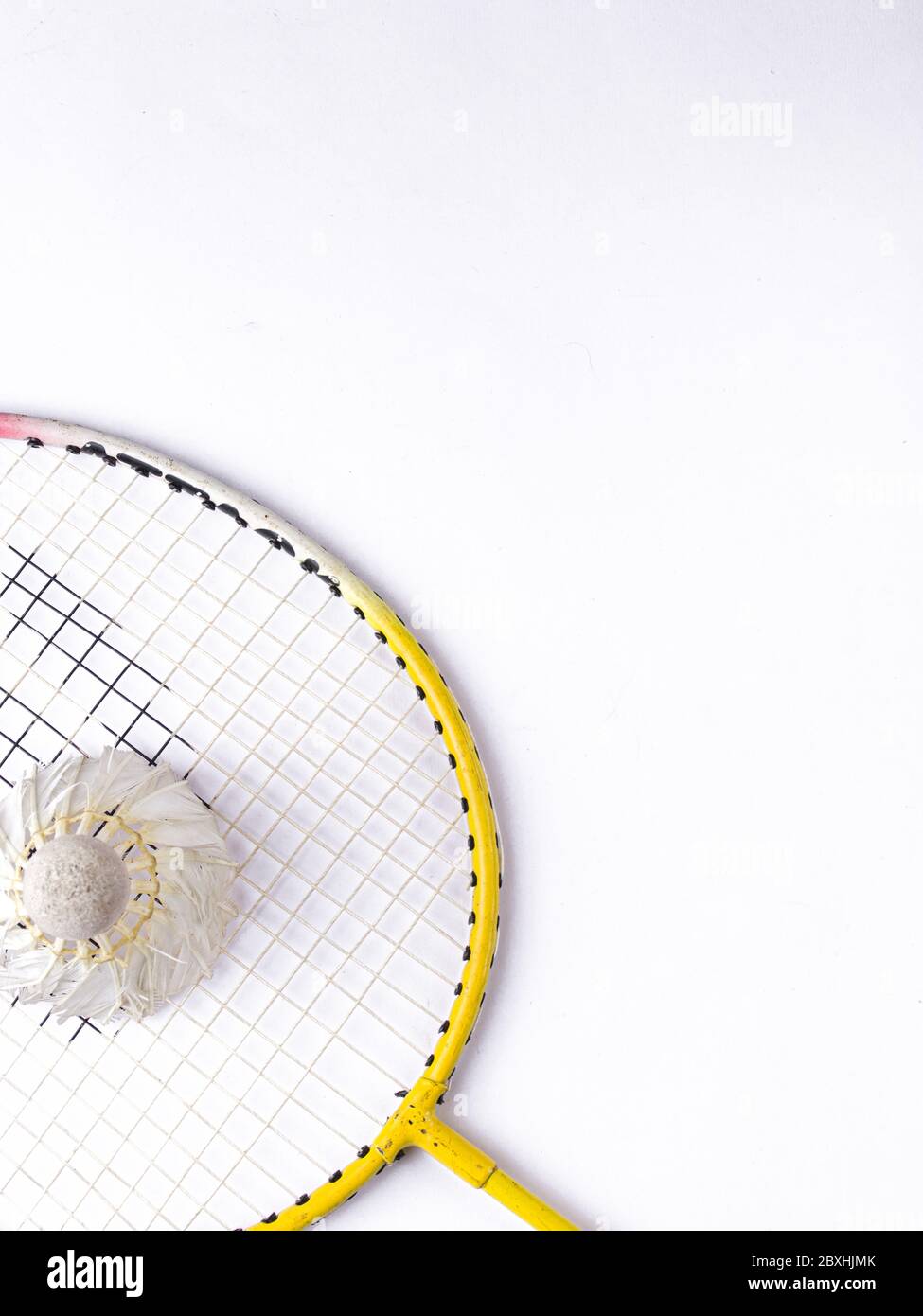 Badminton racket and White Feather Shuttlecock with a colour green ...