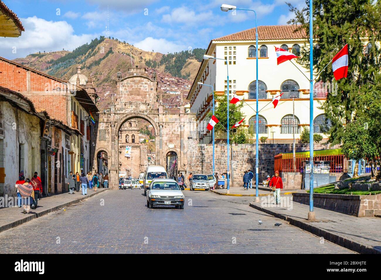 CUSCO, PERU - JULY 9, 2010: Colonial buildings around street of Cusco ...