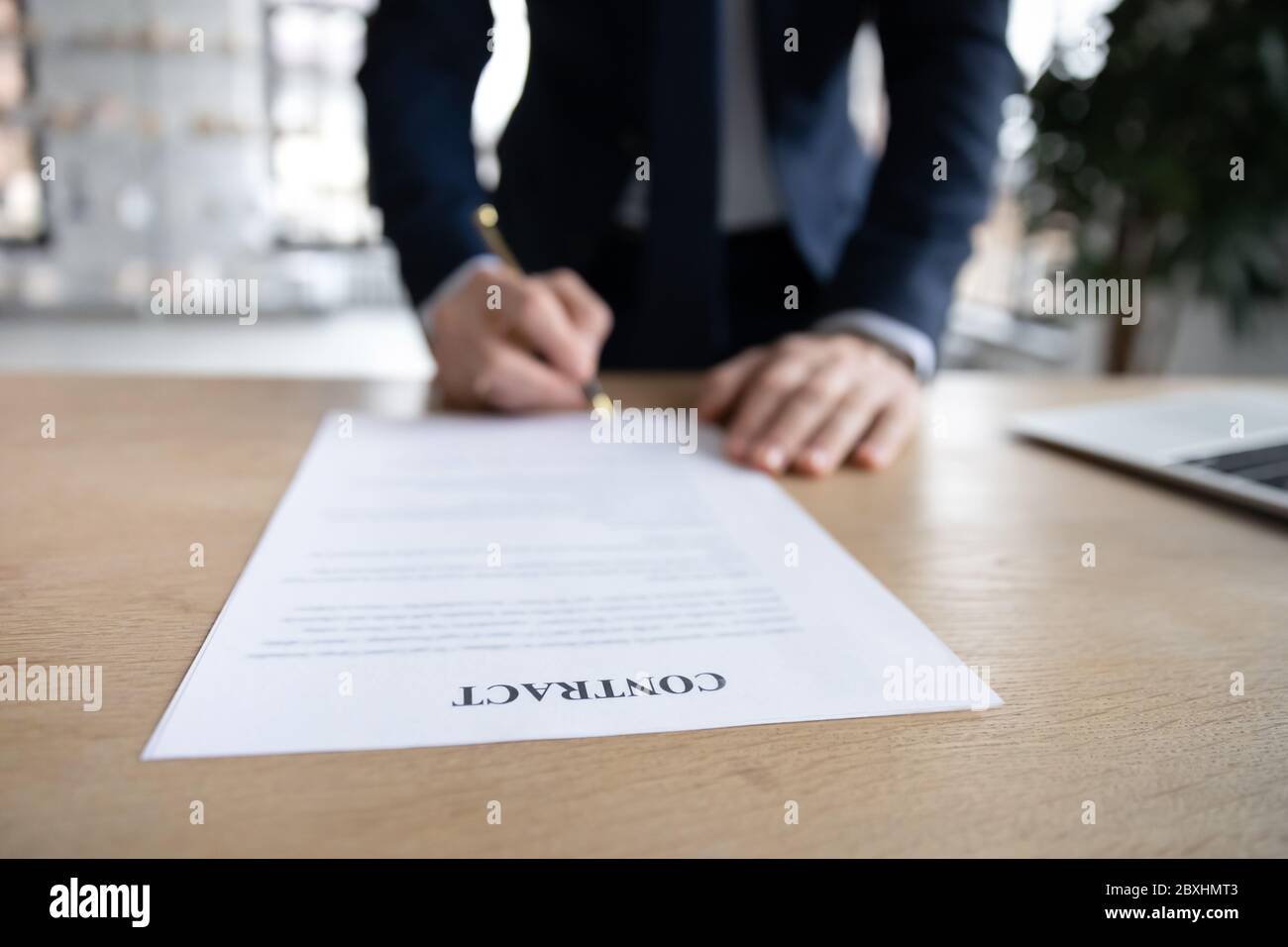 Close up of businessman sign paper contract Stock Photo - Alamy