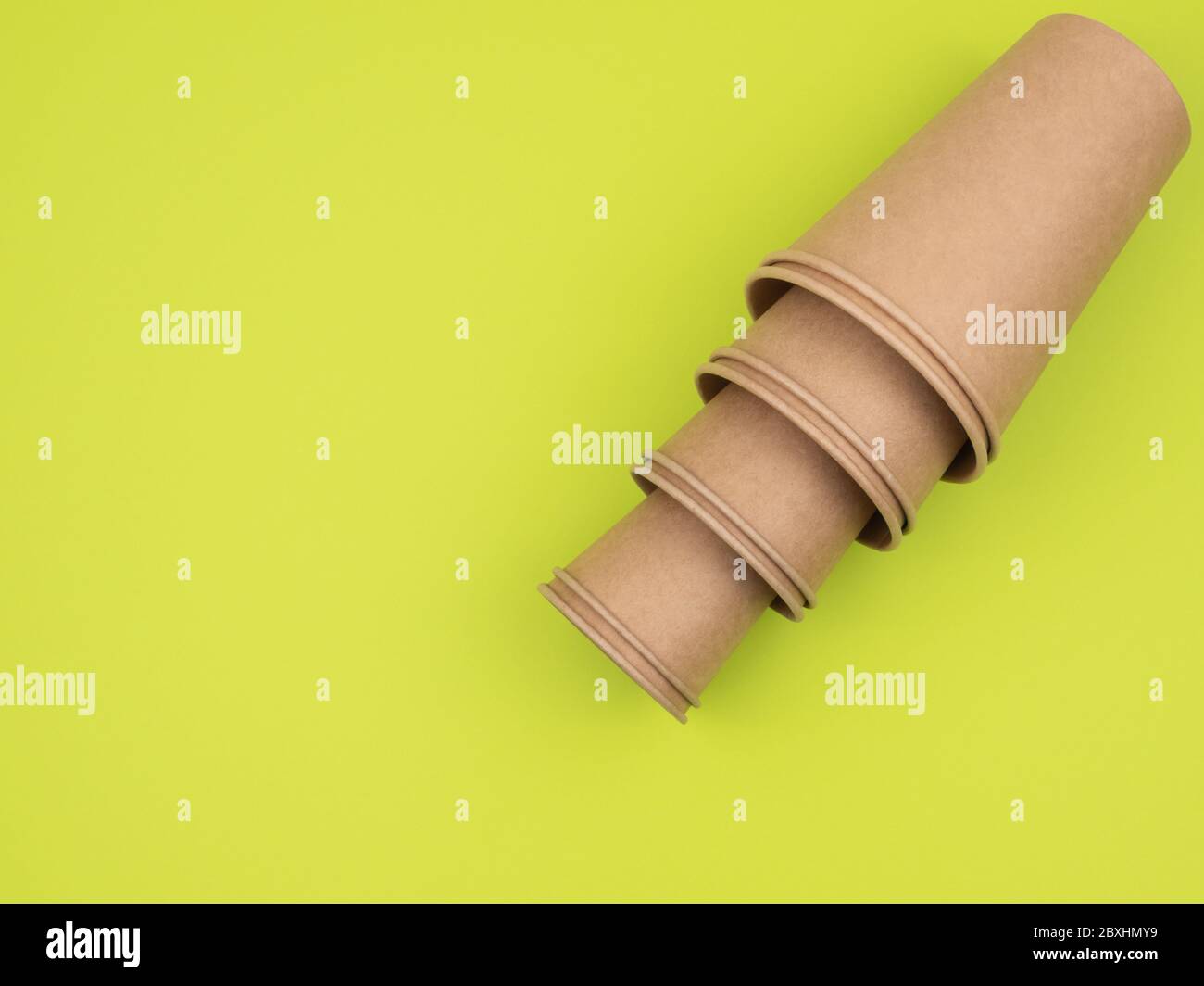 Organic utensils made of ecological materials on a green background ...