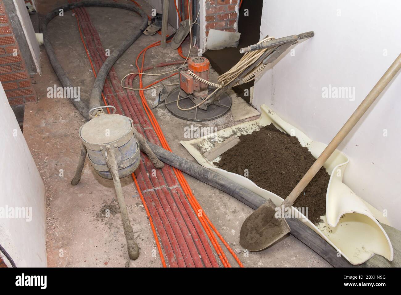 The process of filling floors in a new house. Concrete floors in a new ...