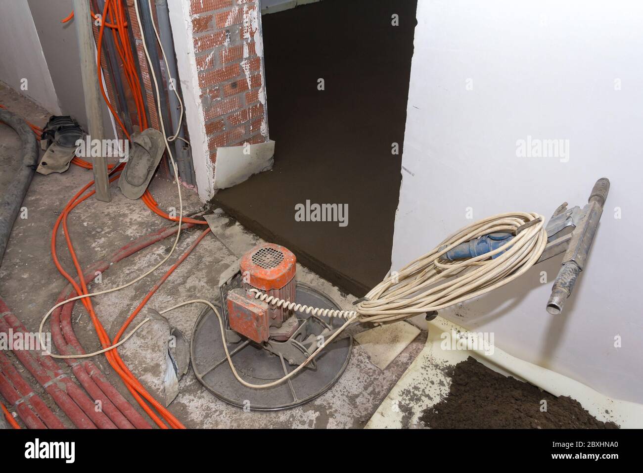 The process of filling floors in a new house. Concrete floors in a new ...