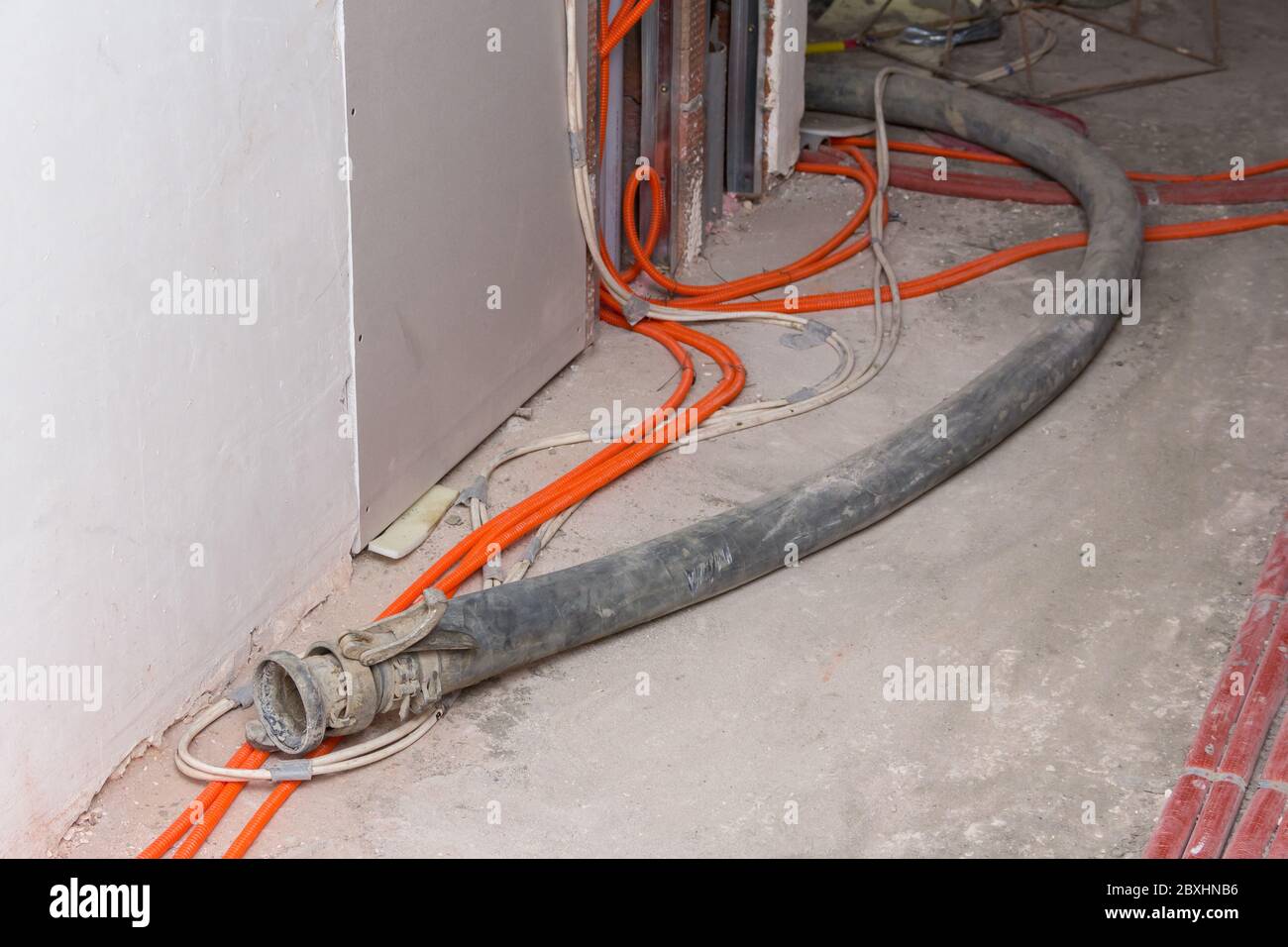 The process of filling floors in a new house. Concrete floors in a new ...