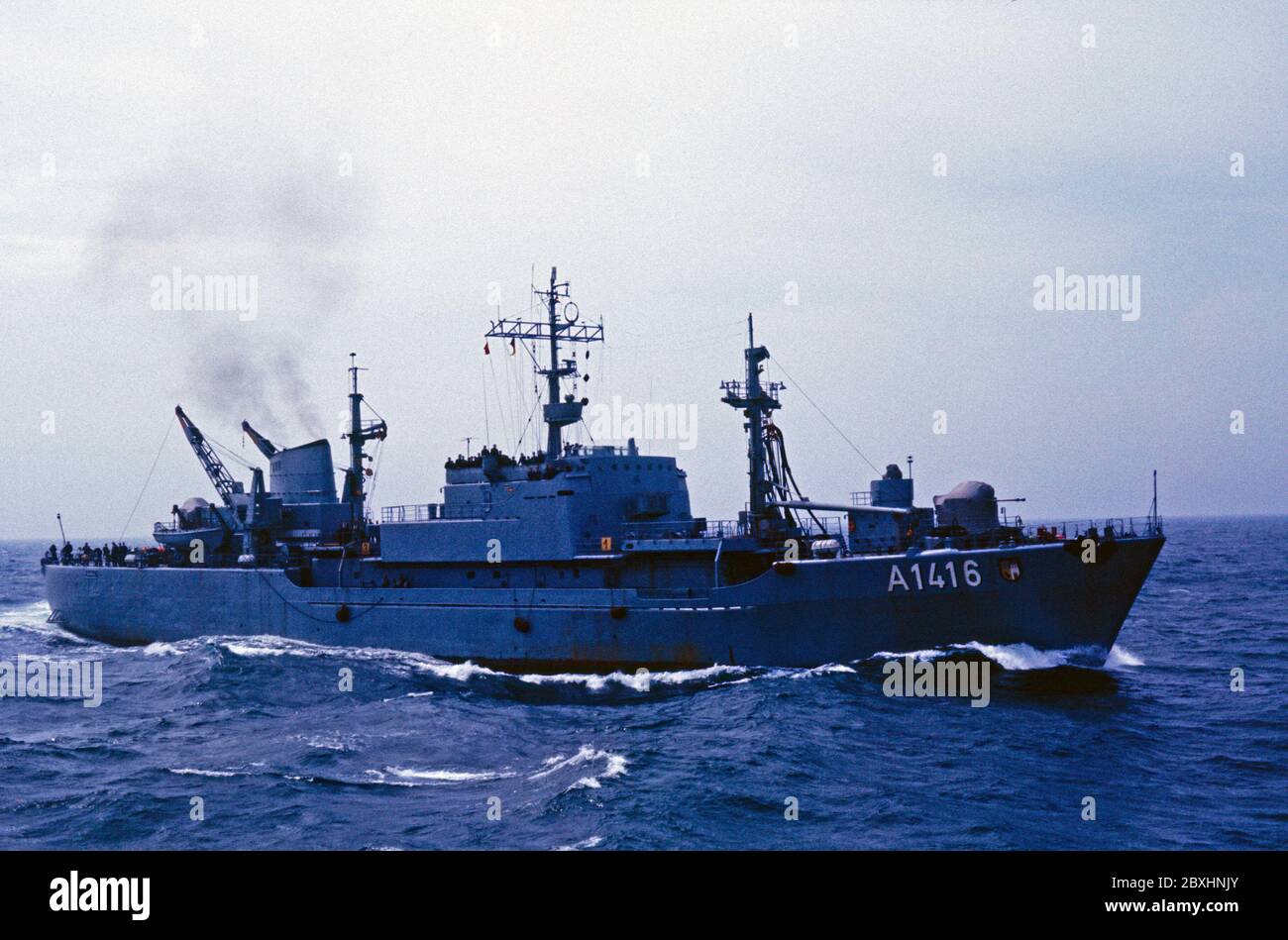 German Navy supply vessel Nienburg doing a manoeuvre with training ship ...