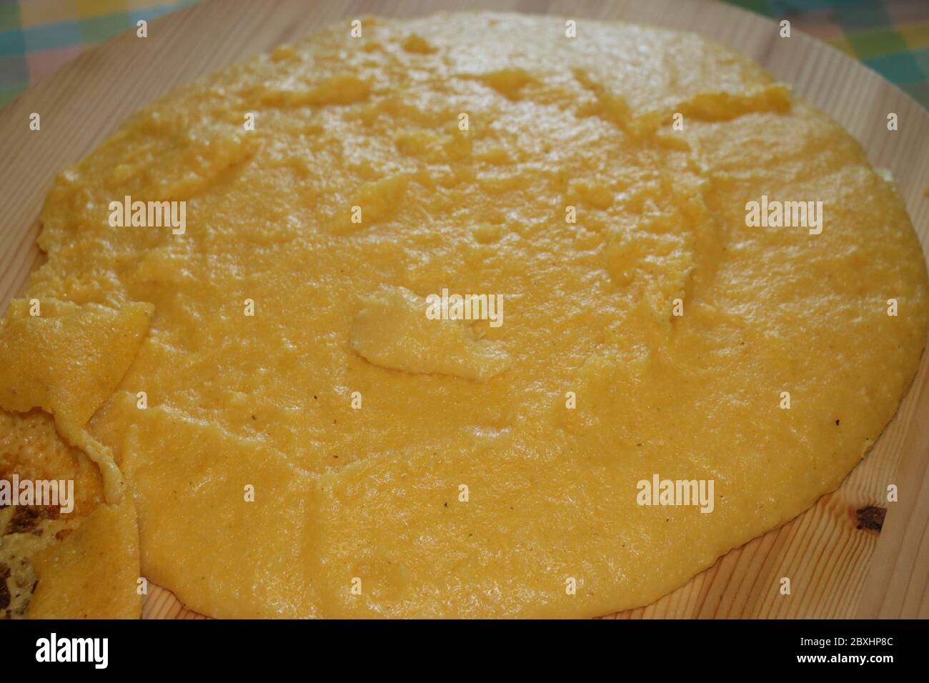 Italian traditional polenta, a dish of boiled cornmeal Stock Photo - Alamy