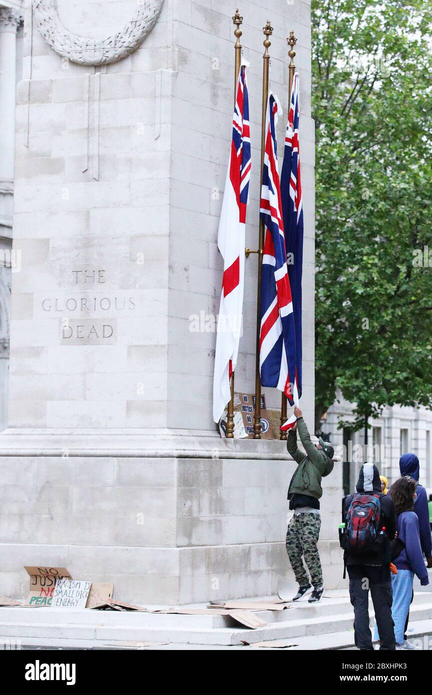 Protesters pull on flags at the cenotaph in whitehall hi-res stock ...