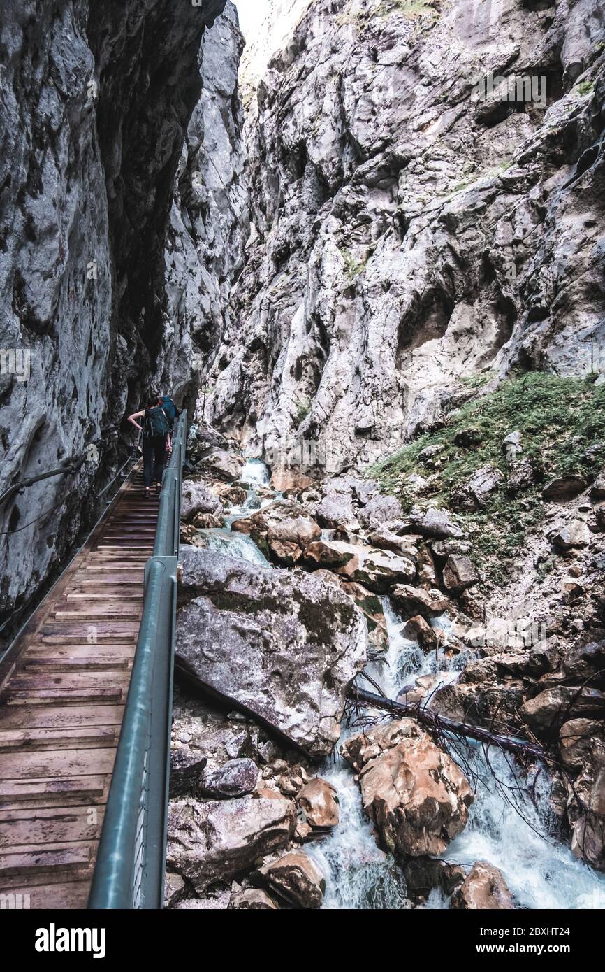 Hiking in the Höllentalklamm gorge below the Zugspitze mountain Stock ...