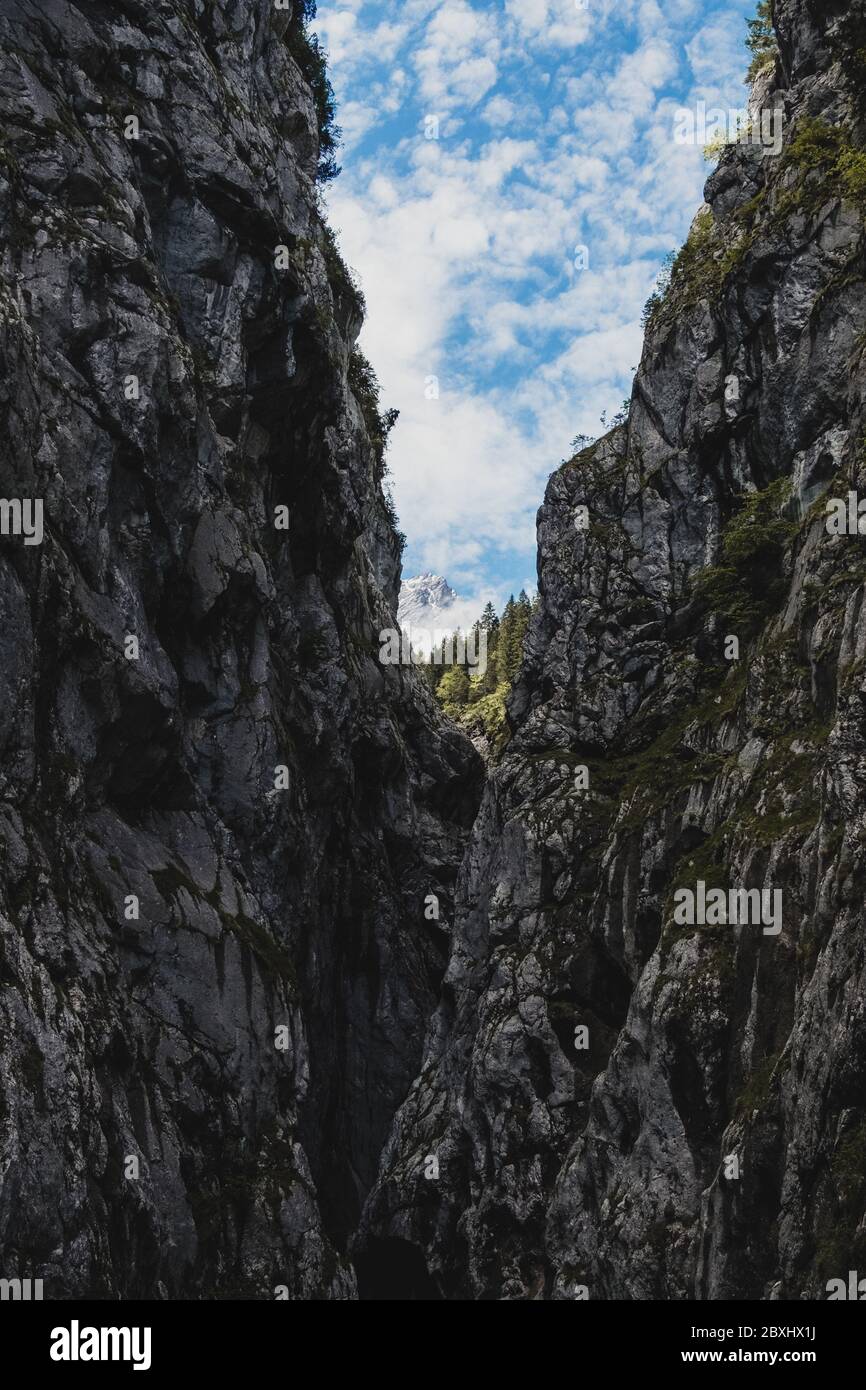 Hiking in the Höllentalklamm gorge below the Zugspitze mountain Stock ...