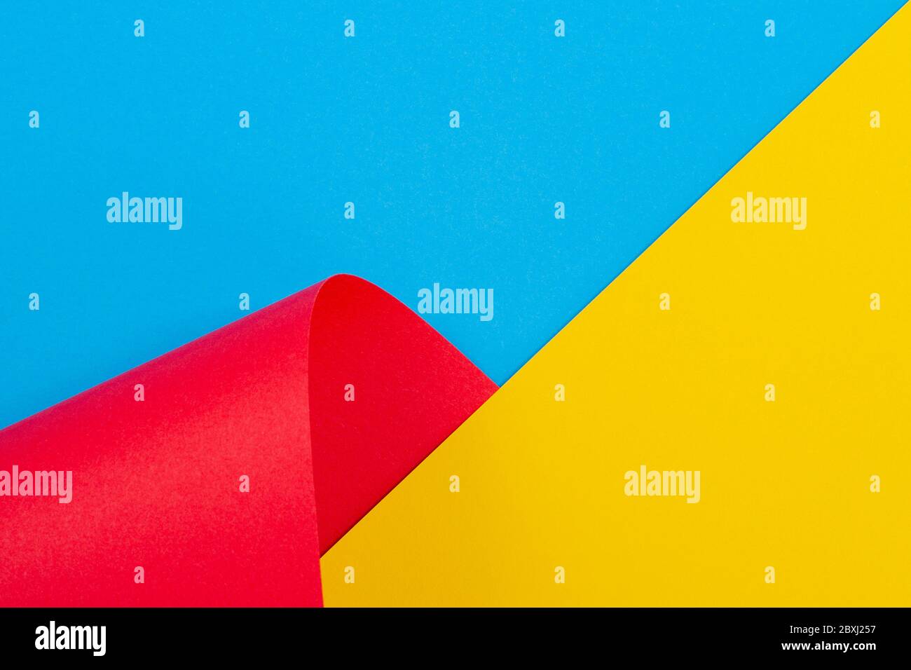 Abstract colorful background. Yellow red blue color paper in geometric ...