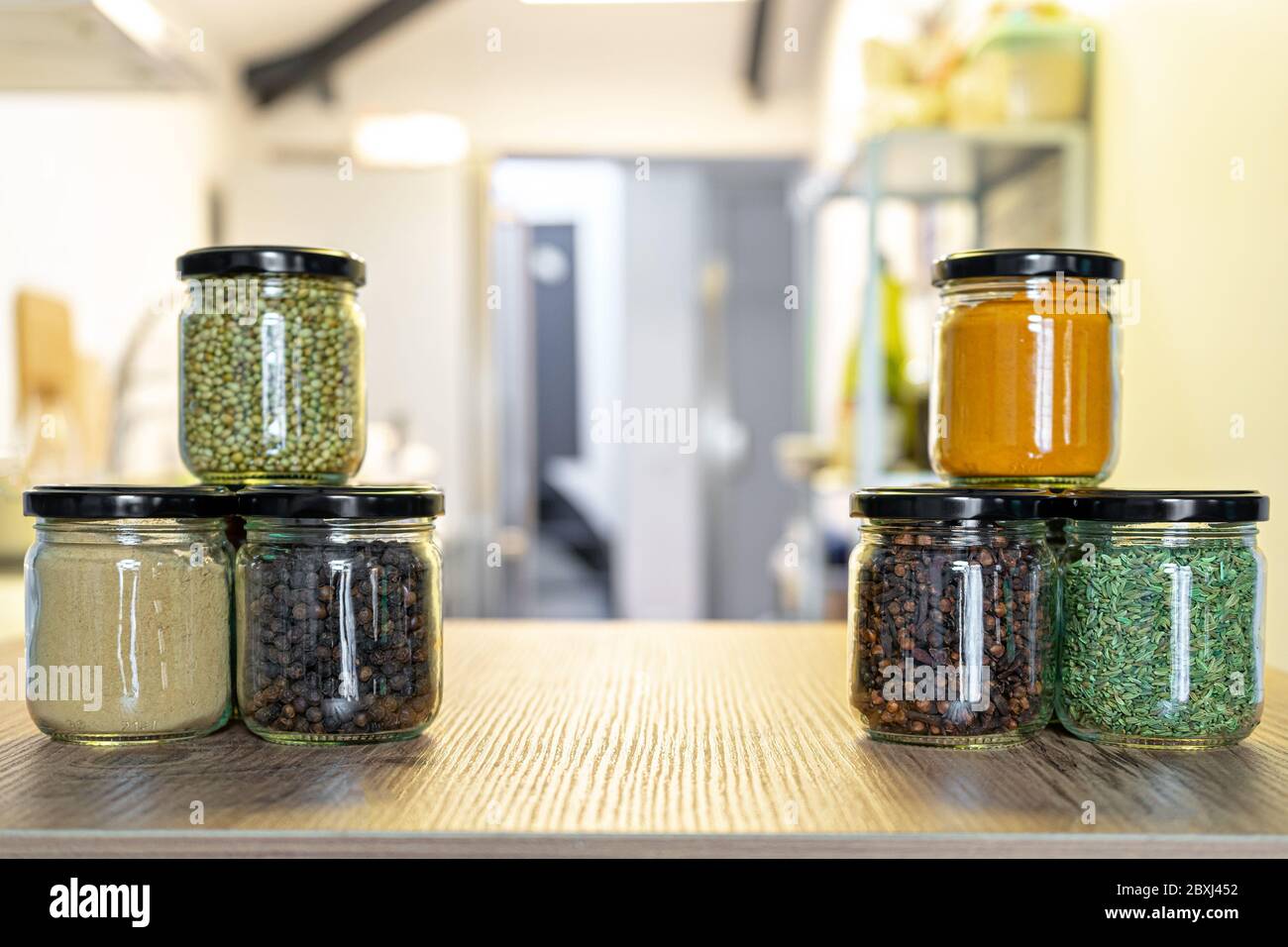 different spice and herb in glass jars for cooking, indian spices ...