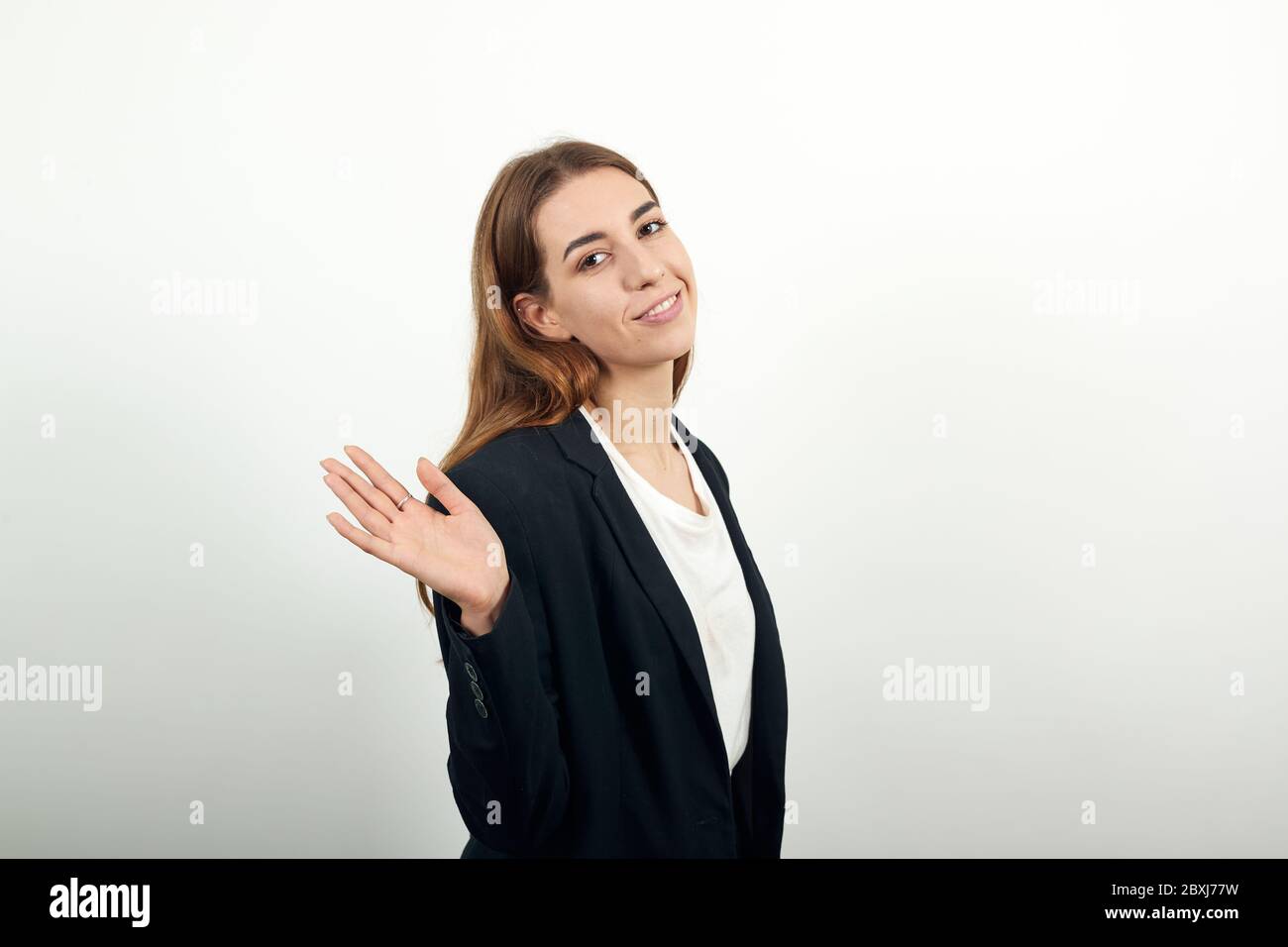 Hello arm sign, showing the five fingers, waving, greeting with hand as ...