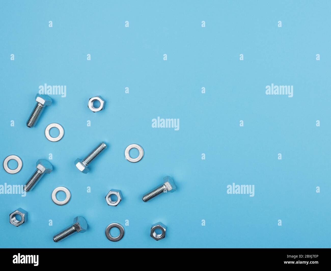 Accessories for mechanical fixing on a blue background Stock Photo - Alamy
