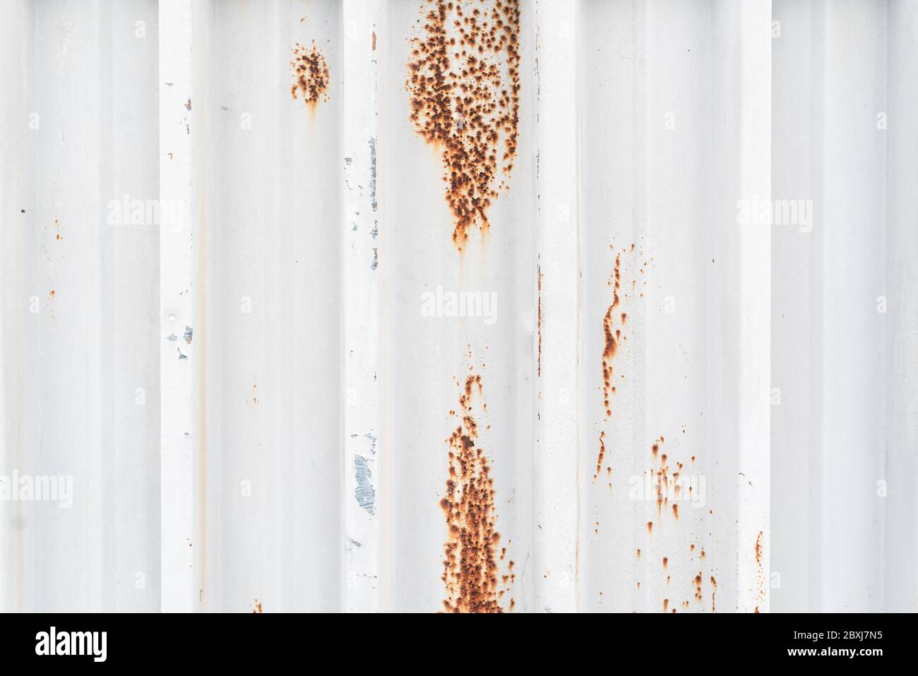 Red spots of rust on the white metal texture construction copy space ...