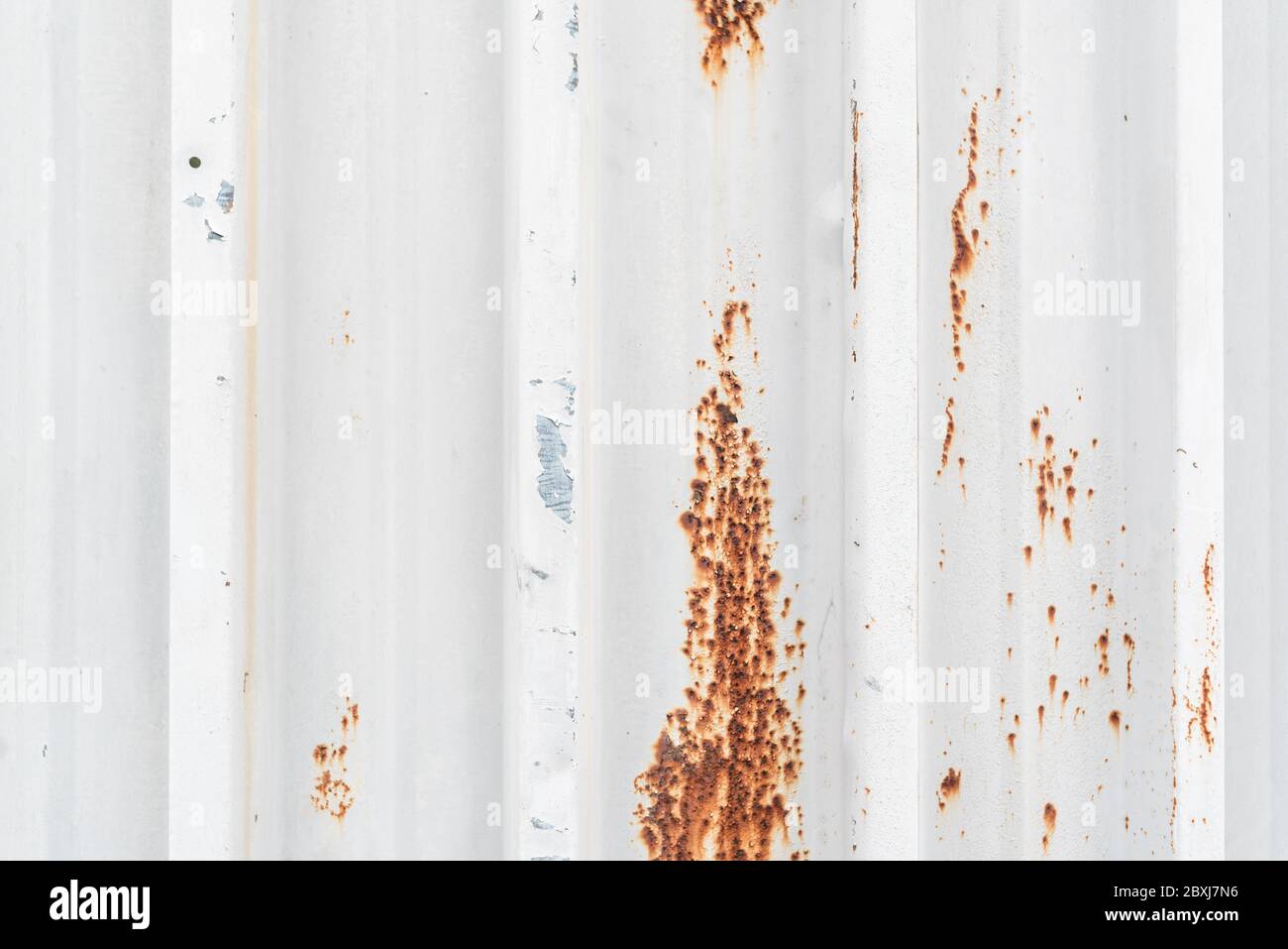 Red spots of rust on the white metal texture construction copy space ...