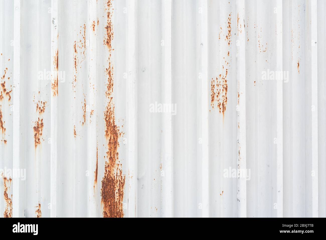 Red spots of rust on the white metal texture construction copy space ...