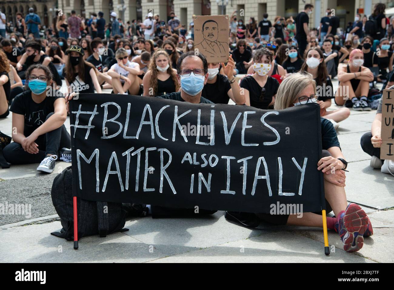 Protesters shows a placard during the Black Lives Matter protest ...