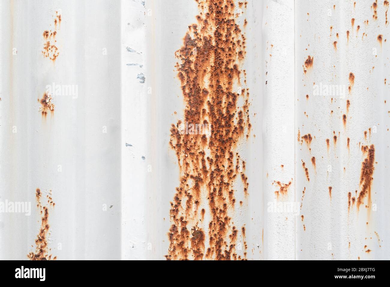 Red spots of rust on the white metal texture construction copy space ...