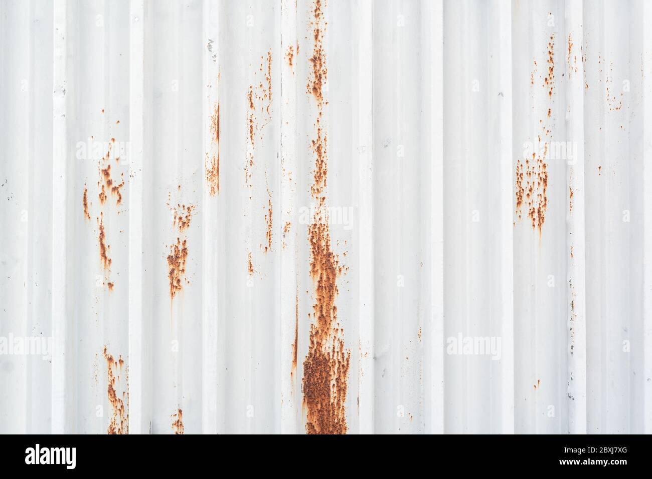 Red spots of rust on the white metal texture construction copy space ...